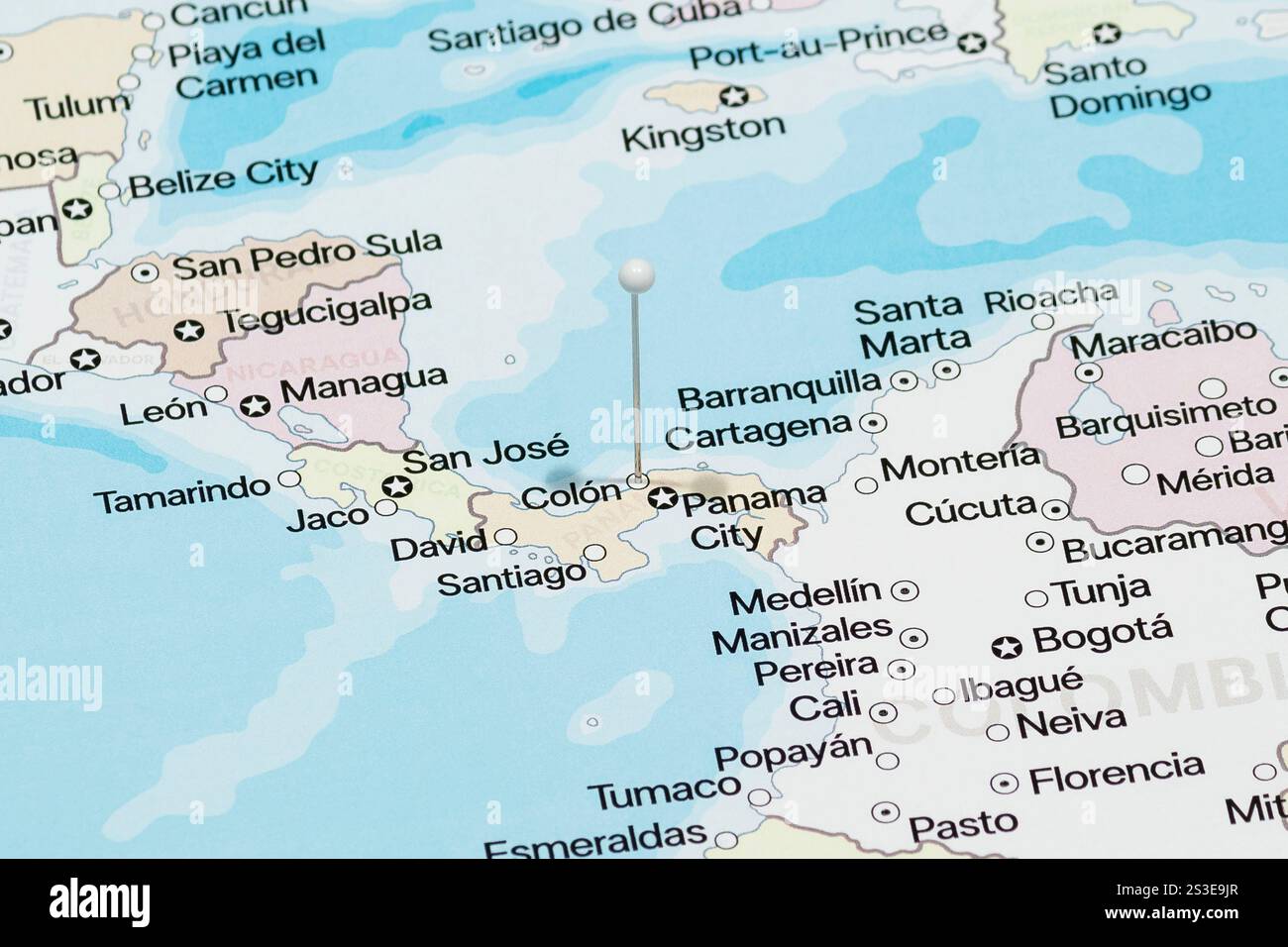 Macro photo of a white pin needle into Colon city of Panama political ...