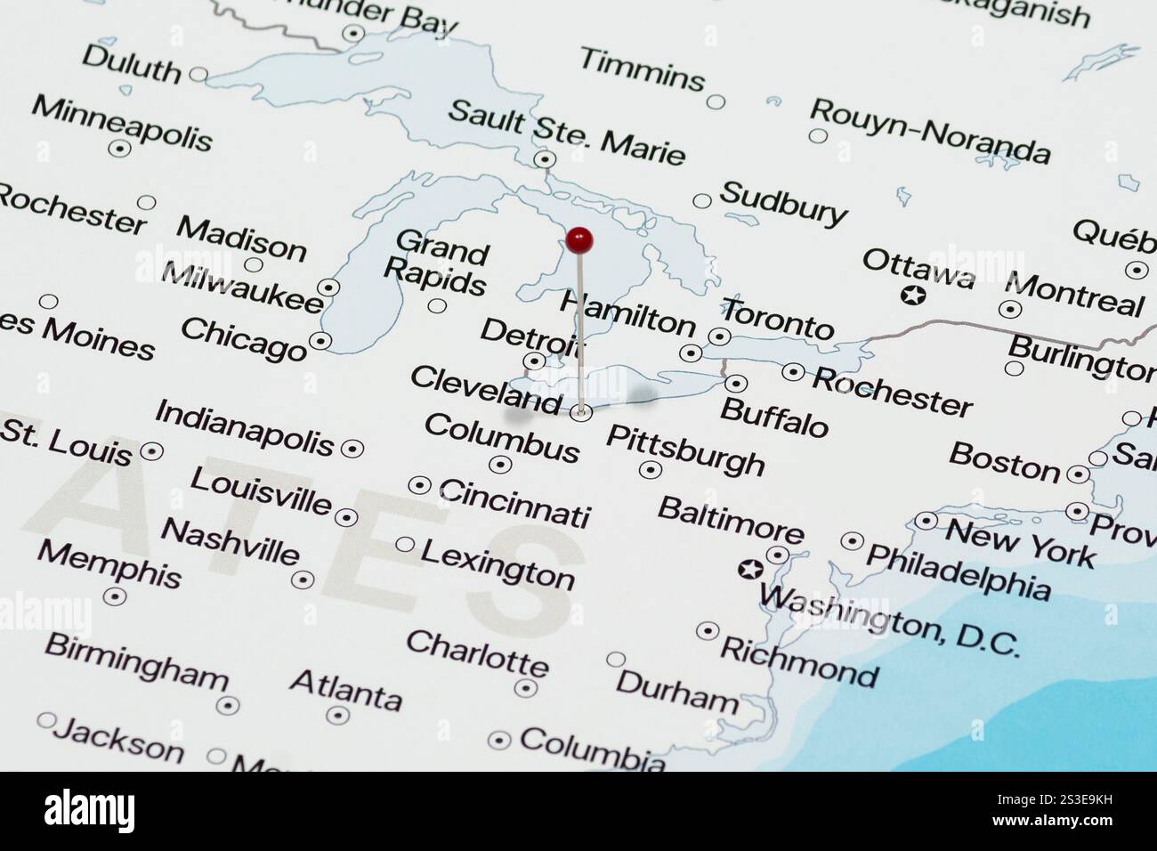 Macro photo of a red pin needle into Cleveland city of United States of ...