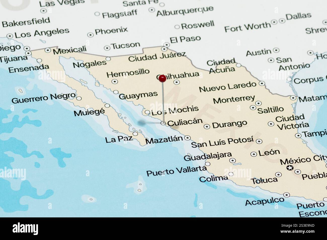 Macro photo of a red pin needle into Culiacan city of Mexico political ...