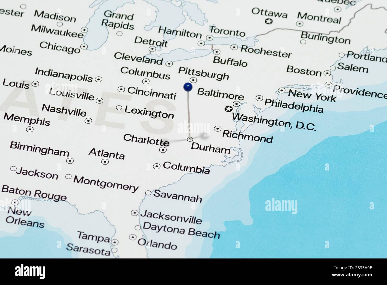 Macro photo of a blue pin needle into Durham city of United States of ...