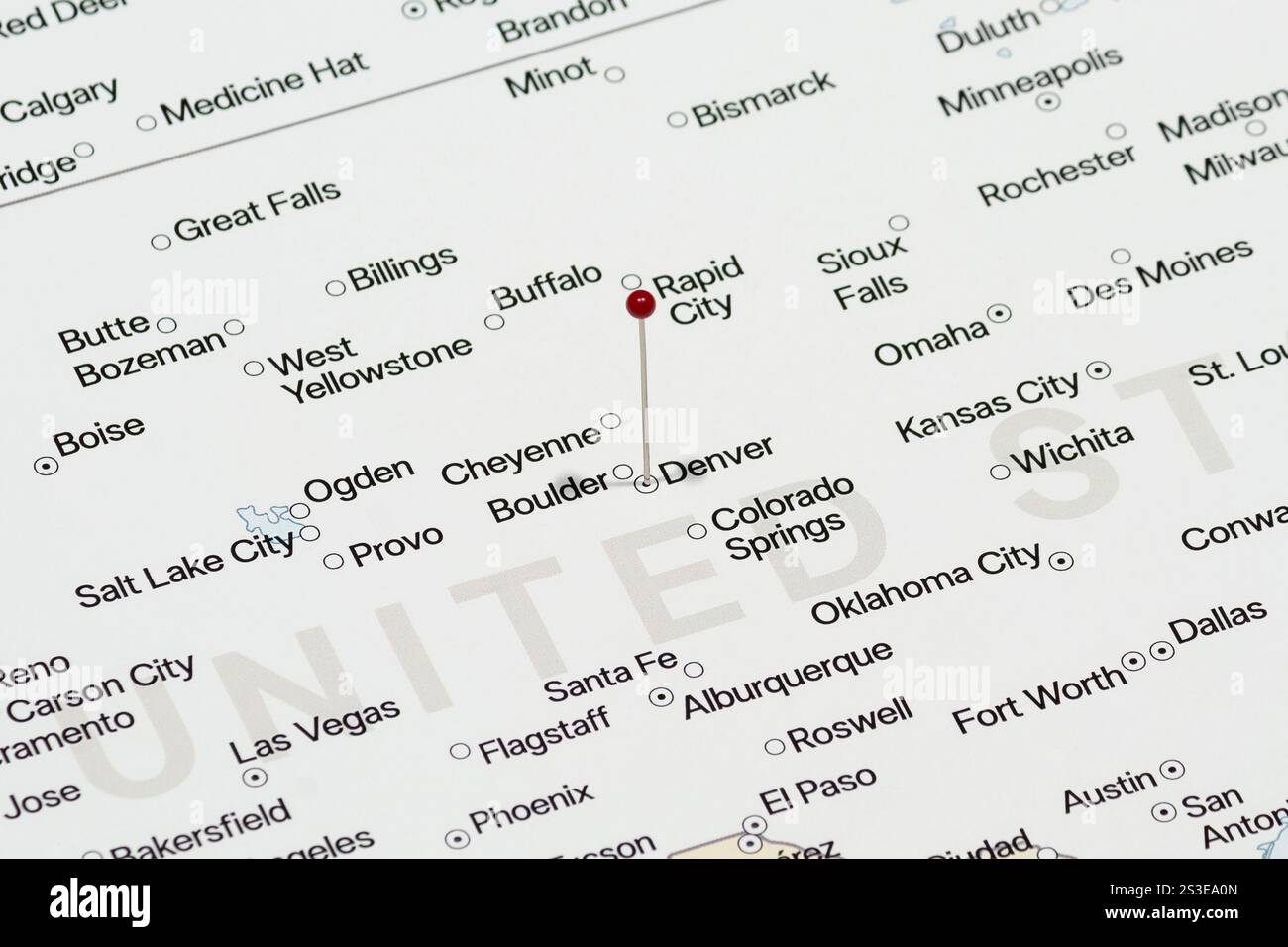 Macro photo of a red pin needle into Denver city of United States of ...