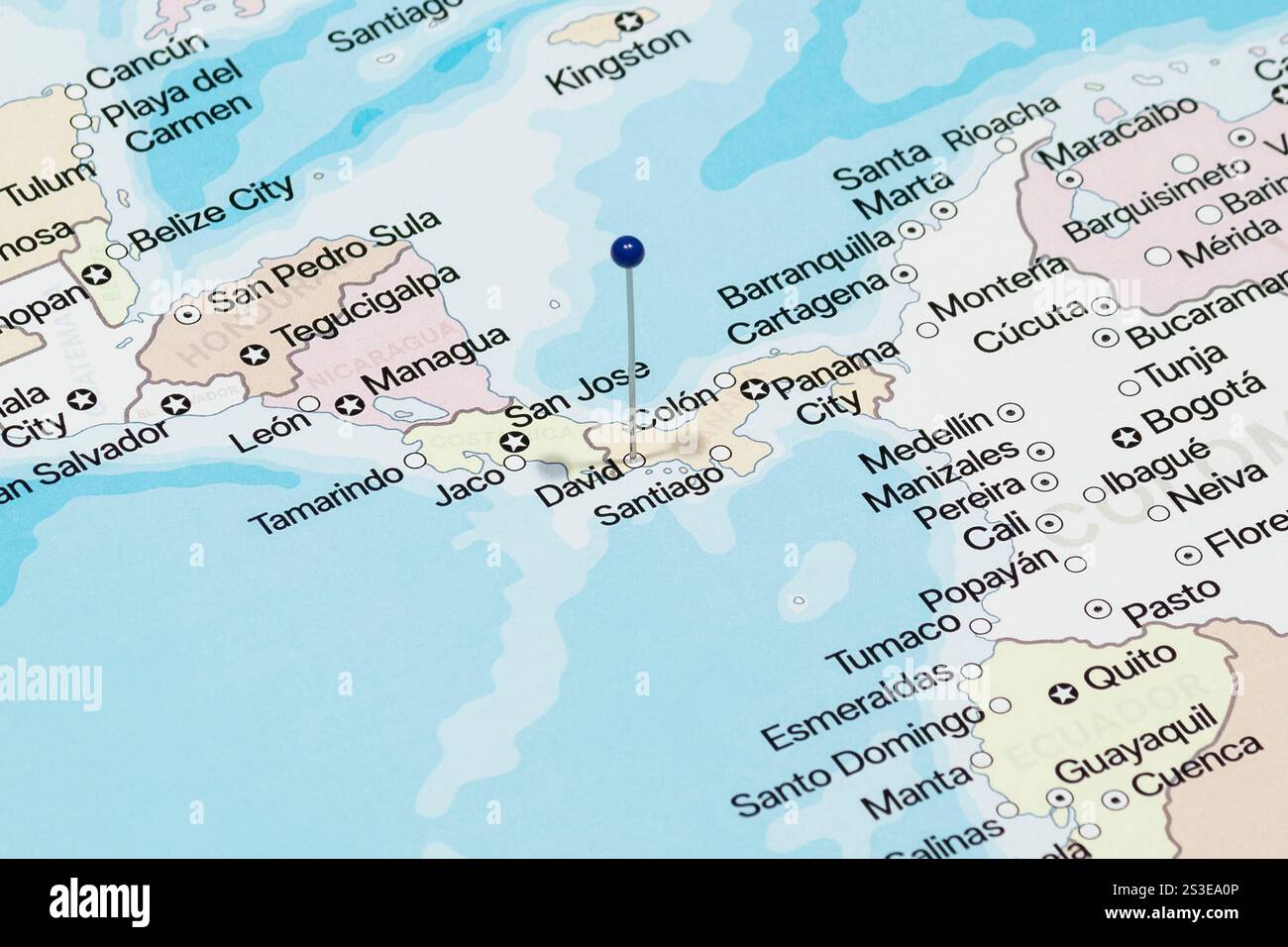 Macro photo of a blue pin needle into David city of Panama political ...