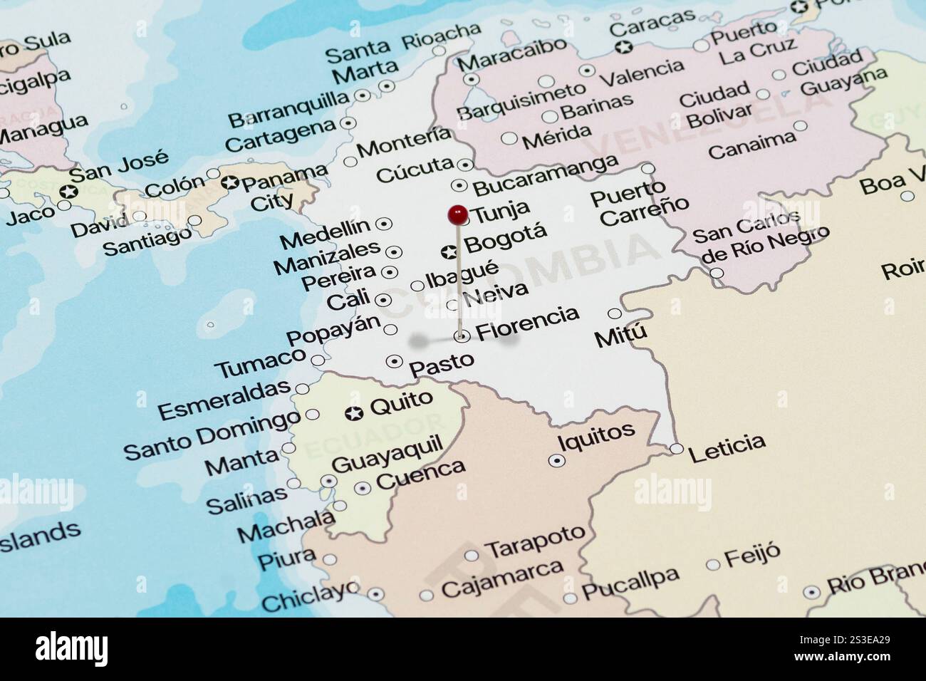 Macro photo of a red pin needle into Florencia city of Colombia ...