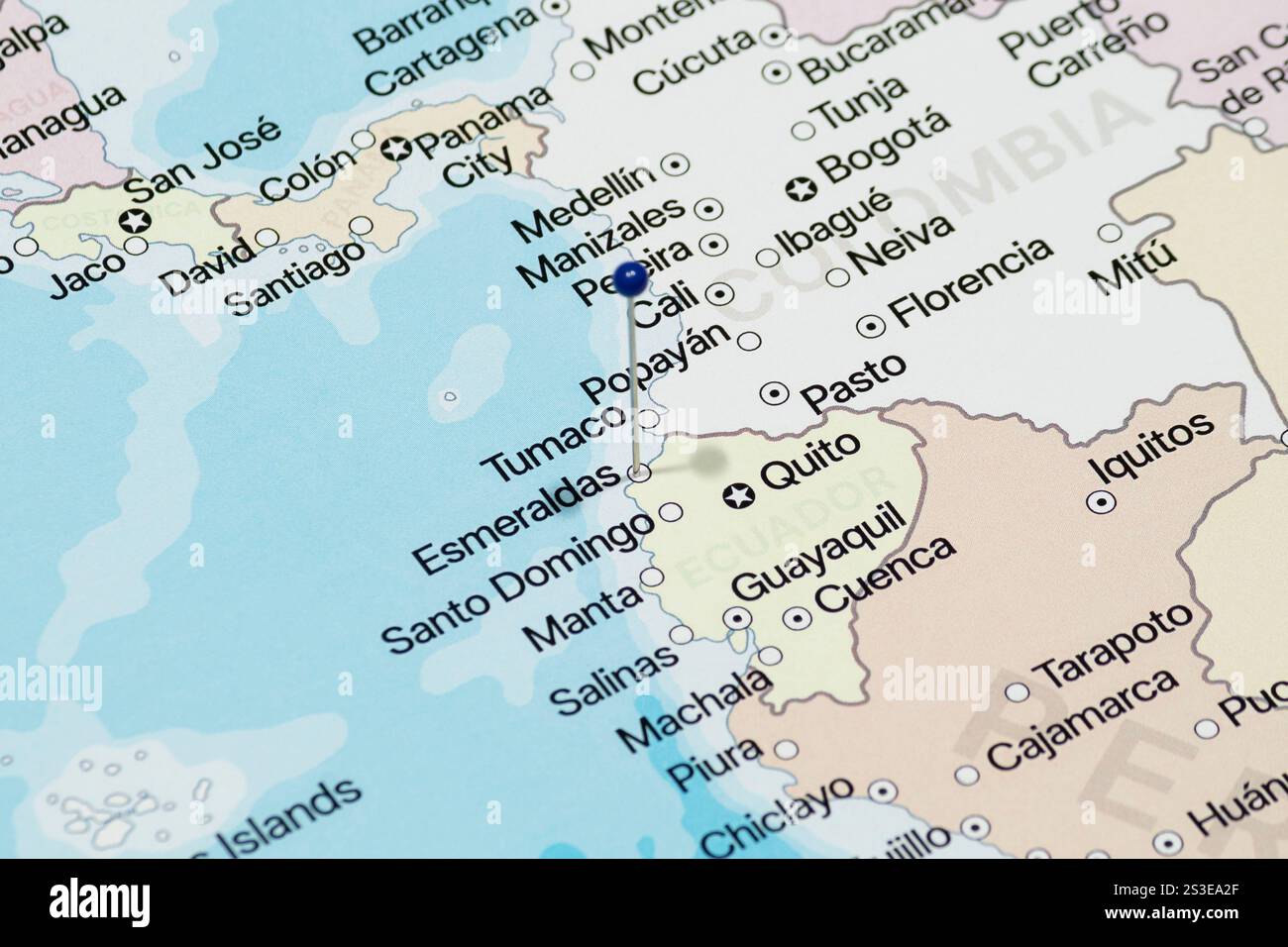 Macro photo of a blue pin needle into Esmeraldas city of Ecuador ...