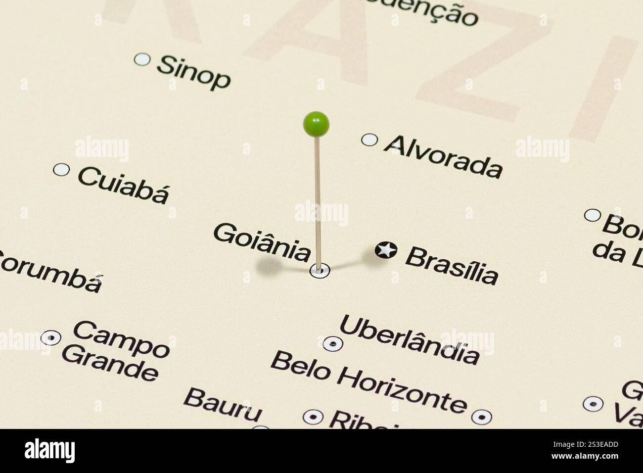 Macro photo of a green pin needle into Goiania city of Brazil political ...