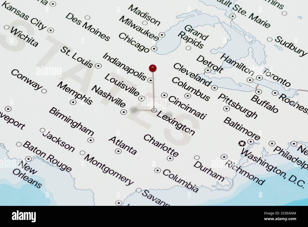 Macro photo of red pin needle into Lexington city of United States of ...