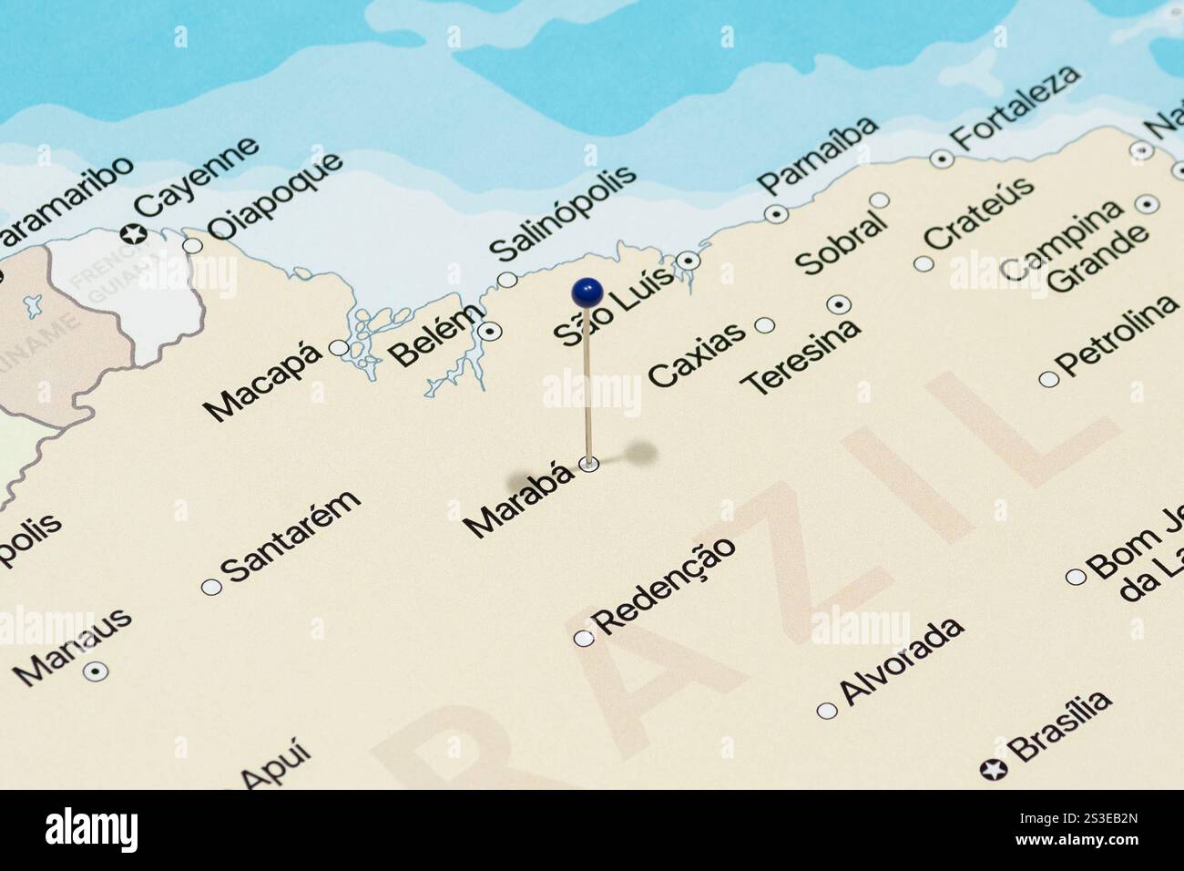 Macro photo of a blue pin needle into maraba city of Brazil political ...