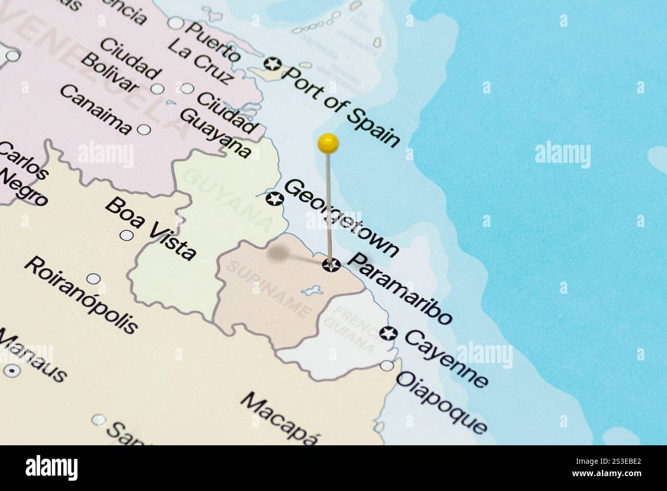 Macro photo of a yellow pin needle into Paramaribo city of Brazil ...