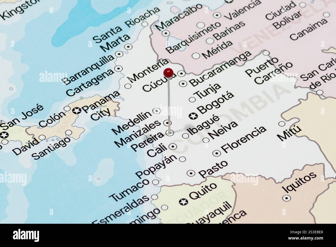 Macro photo of a red pin needle into Pereira city of Colombia political ...