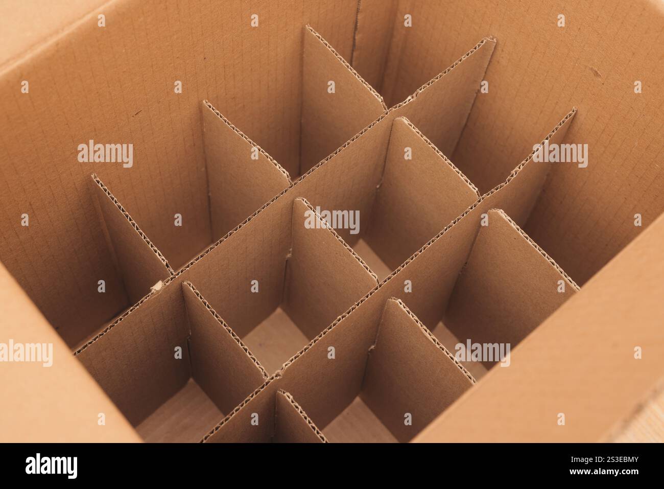 A cardboard box equipped with dividers designed specifically for ...