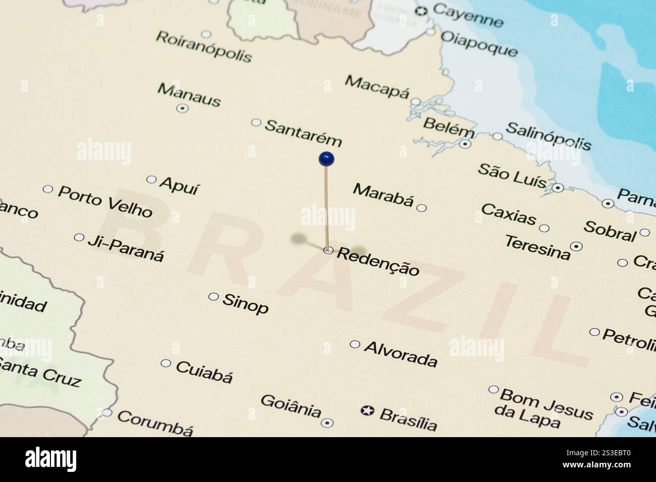 Macro photo of a blue pin needle into Redenção city of Brazil political ...