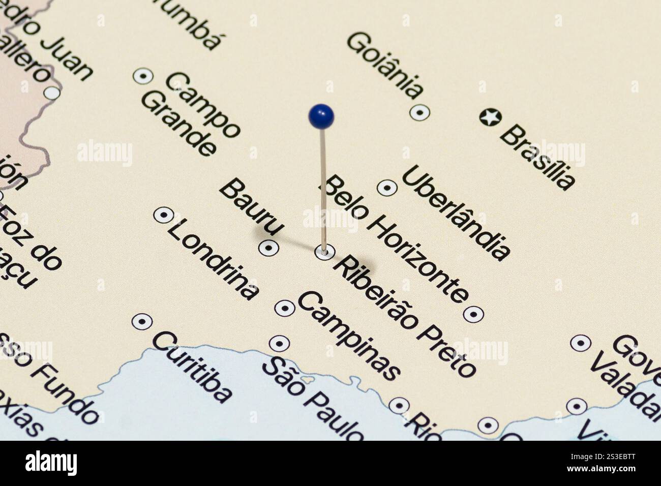 Macro photo of a blue pin needle into Ribeirão Preto city of Brazil ...