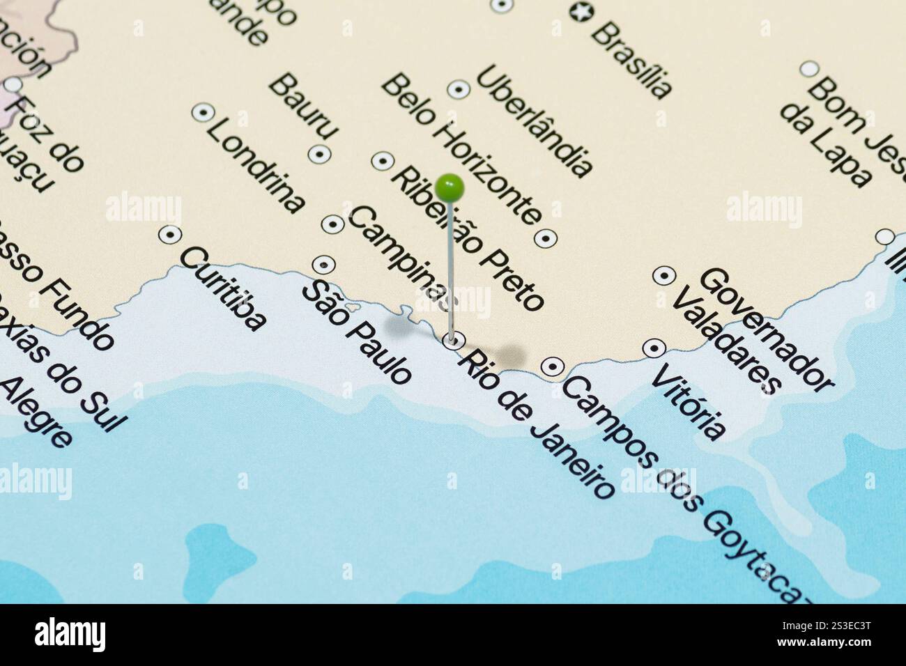 Macro photo of a green pin needle into Rio de Janeiro city of Brazil ...