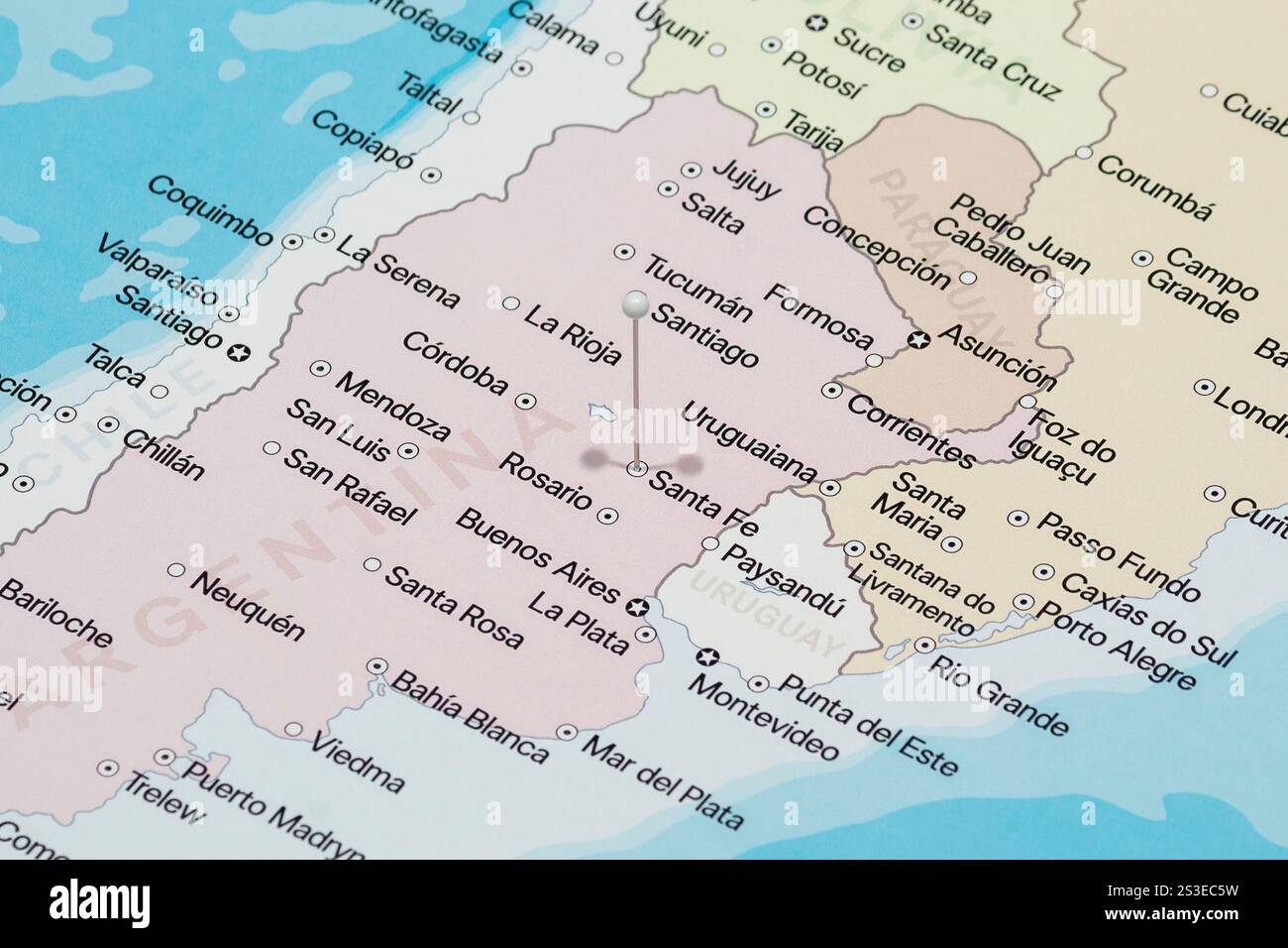 Macro photo of a white pin needle into Santa Fe city of Argentina political map Stock Photo - Alamy
