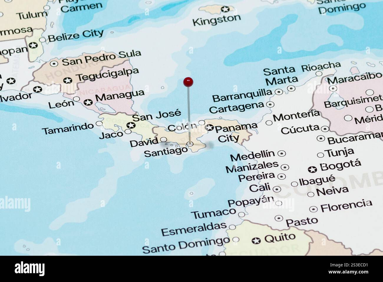 Macro photo of a red pin needle into Santiago city of Panama political ...