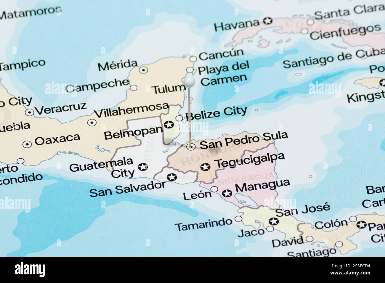 Macro photo of a white pin needle into San Pedro Sula city of Honduras ...
