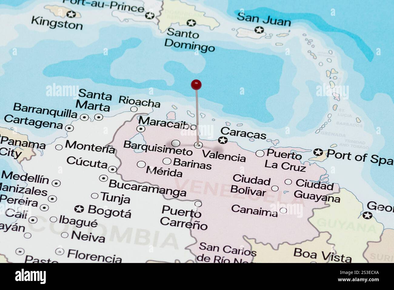 Macro photo of a red pin needle into Valencia city of Venezuela ...