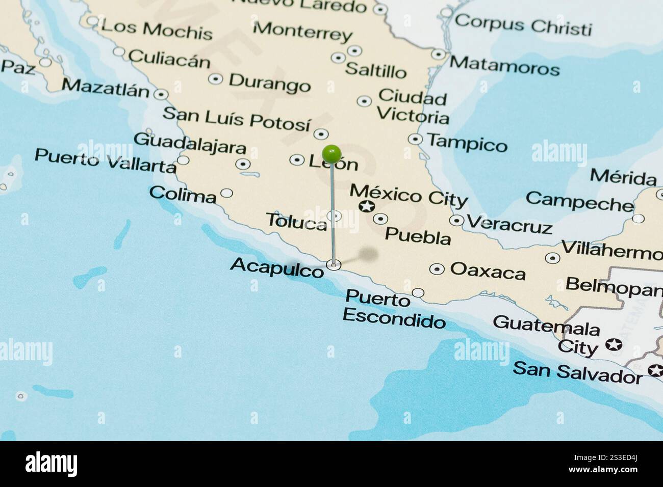 Macro Photo Of A Green Pin Needle Into Acapulco City Of Mexico