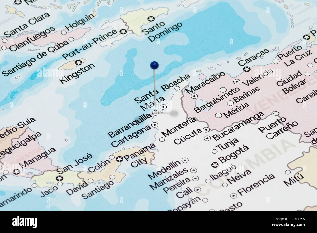 Macro photo of a blue pin needle into Barranquilla city of Colombia ...