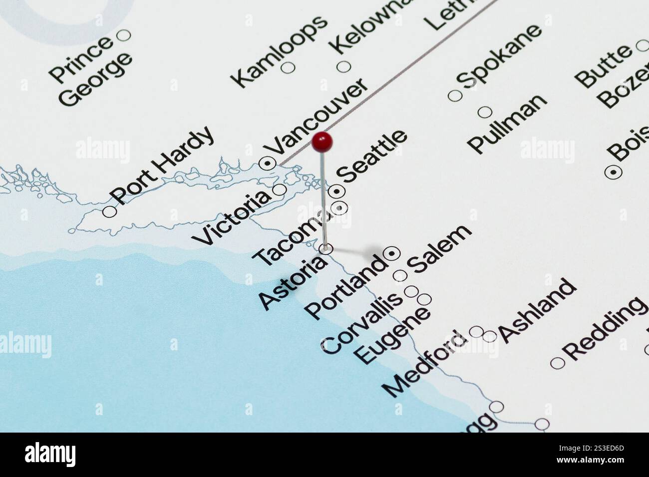 Macro photo of a red pin needle into Astoria city of United States of ...