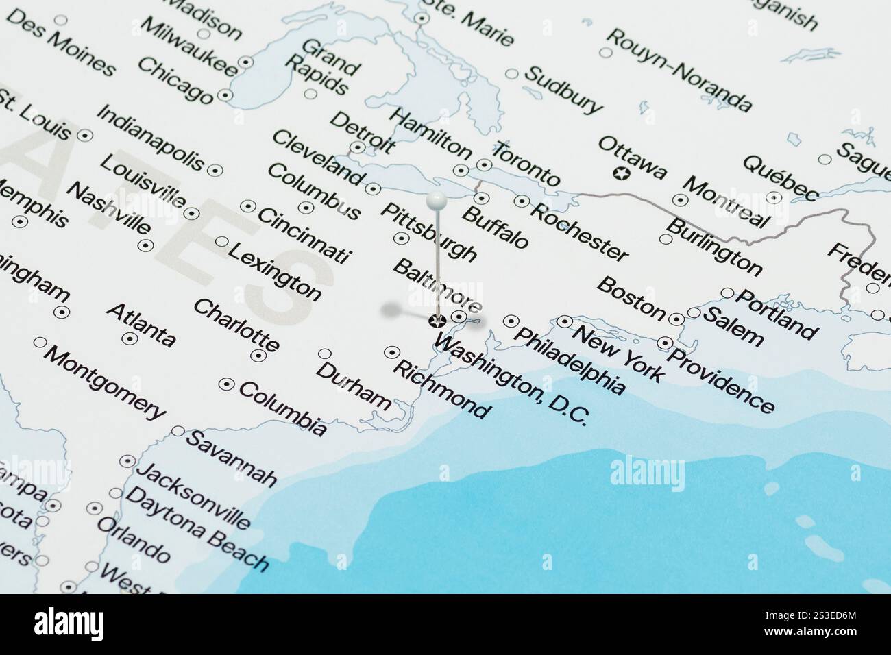 Macro photo of a white pin needle into Washington DC Capital city of ...