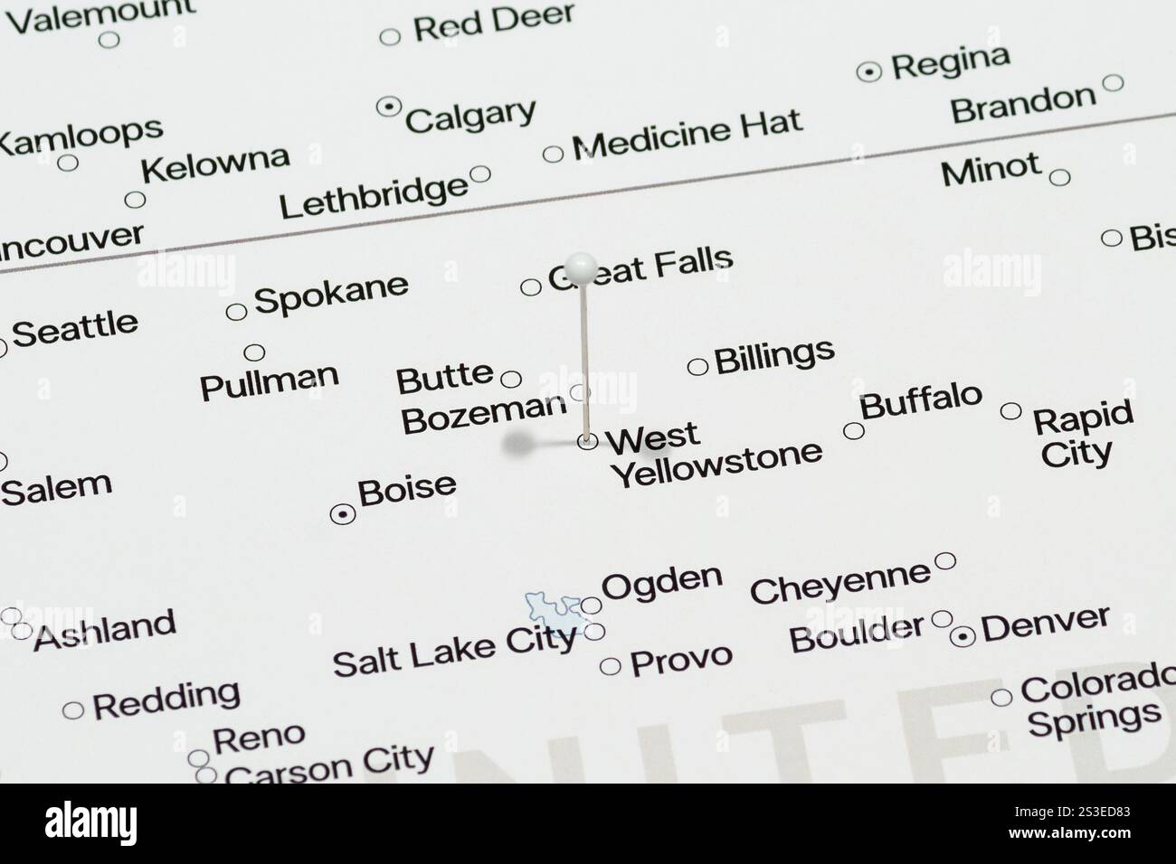 Macro photo of a white pin needle into West Yellowstone city of United ...