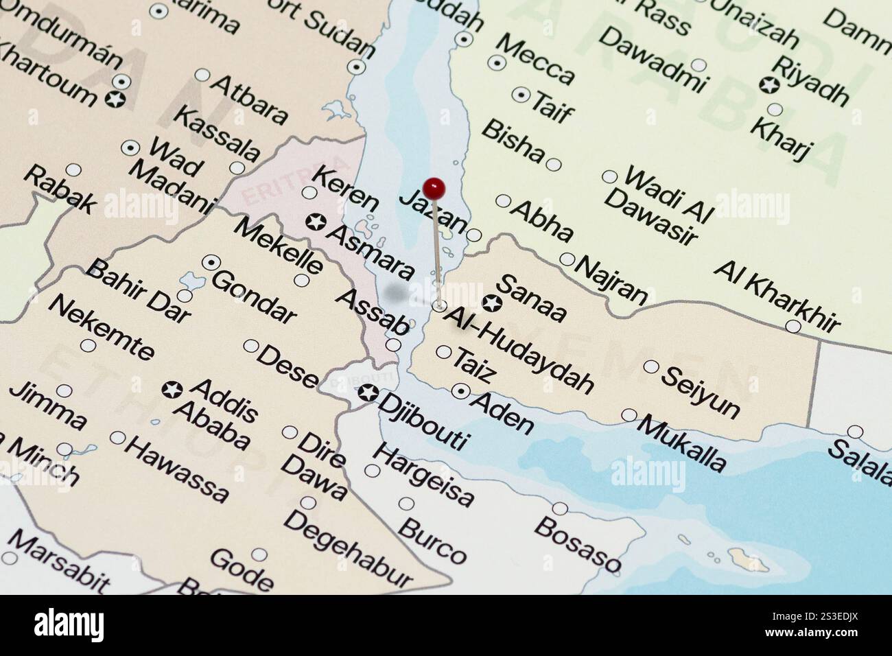 Macro photo of a red pin needle into Al Hudaydah city of Yemen ...