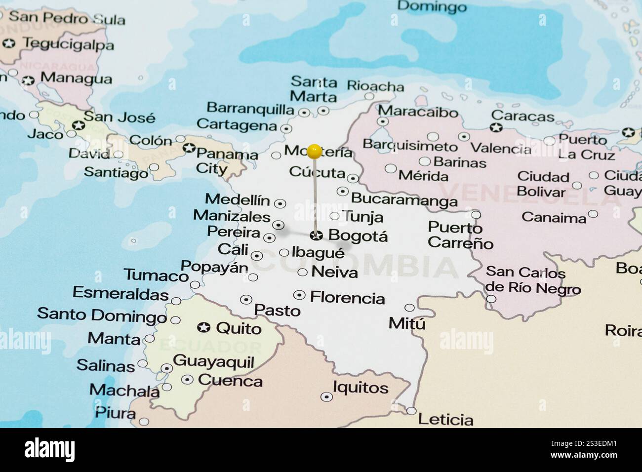 Macro photo of a yellow pin needle into Bogota city of Colombia ...