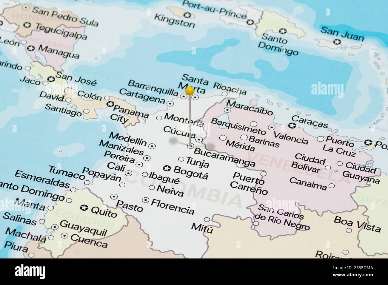 Macro photo of a yellow pin needle into Bucaramanga city of Colombia ...