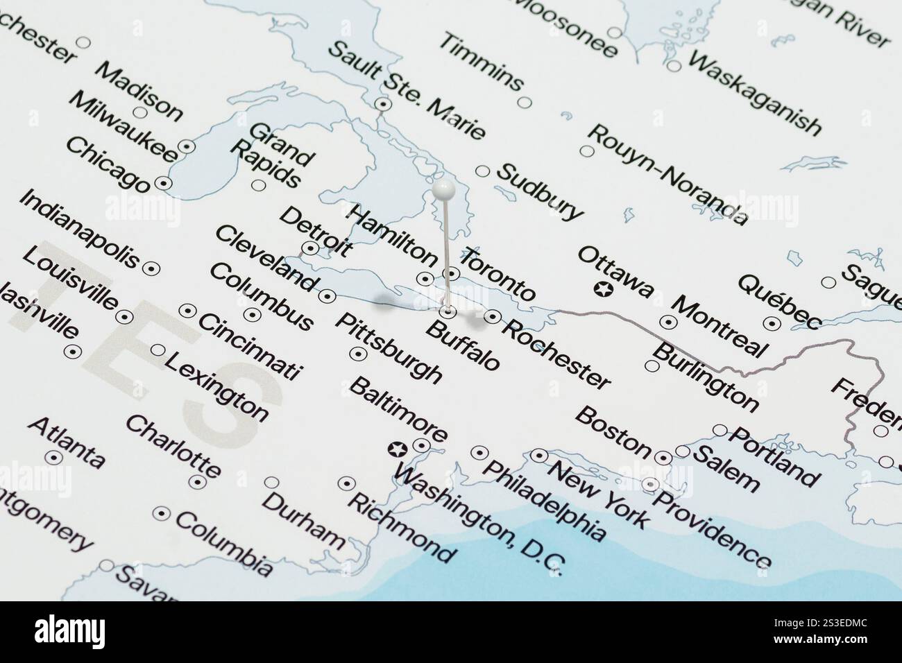 Macro photo of a white pin needle into Buffalo city of United States of ...
