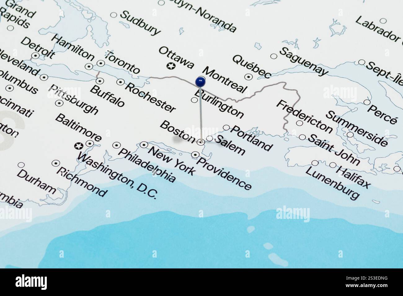 Macro photo of a blue pin needle into Boston city of United States of ...