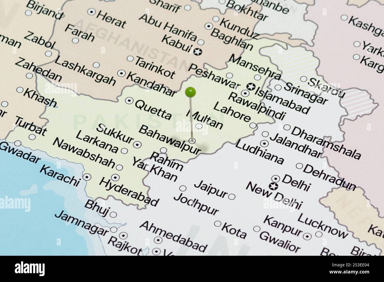 Macro photo of a green pin needle into Bahawalpur city of Pakistan ...