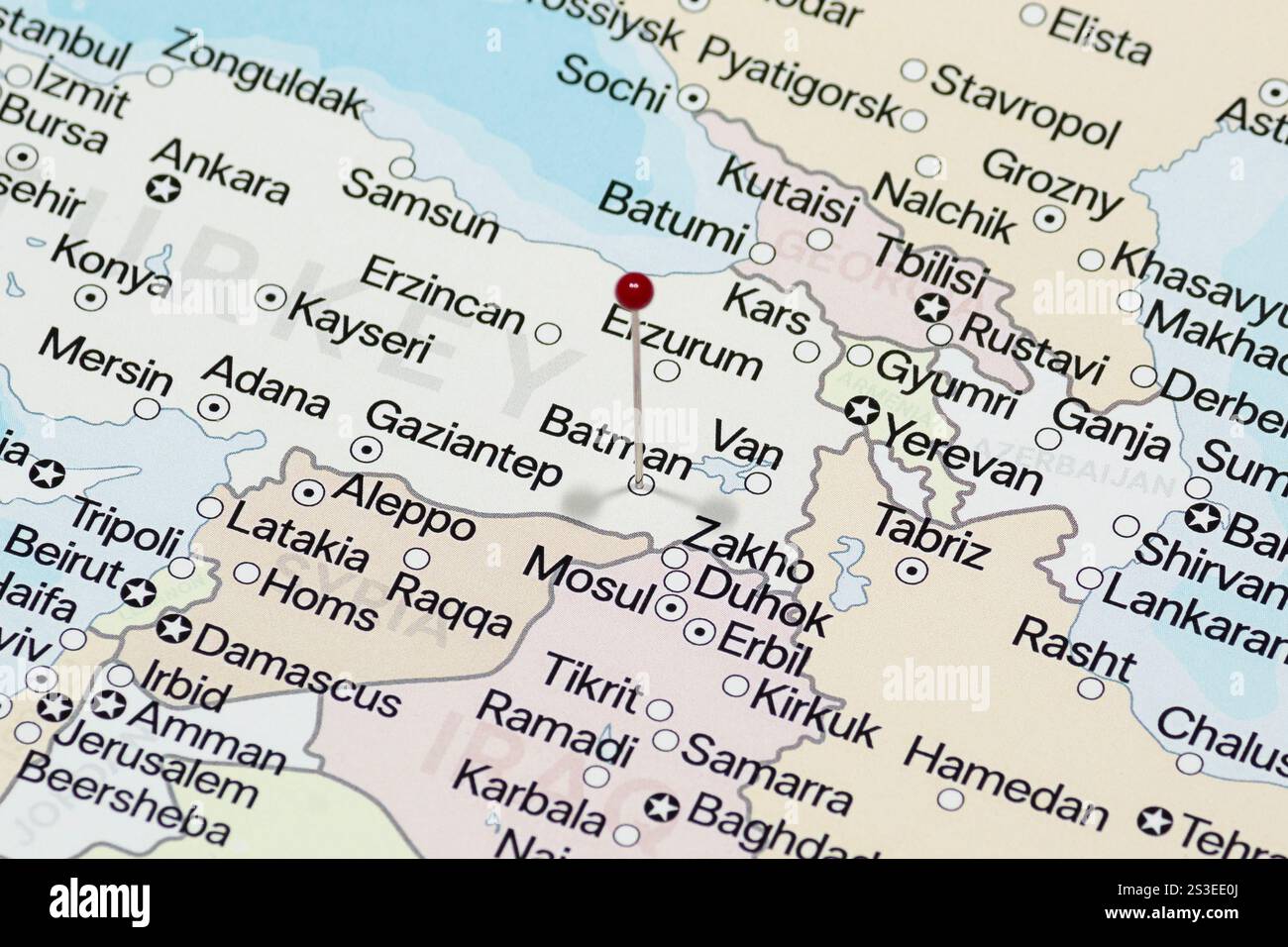 Macro photo of a red pin needle into Batman city of Turkey political ...