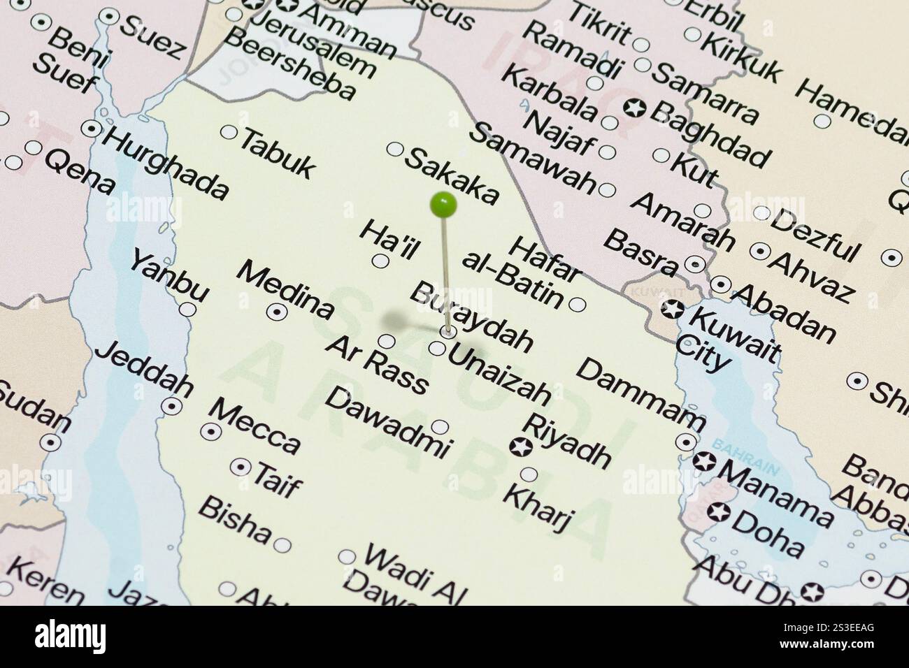 Macro photo of a green pin needle into Buraydah city of Saudi Arabia ...