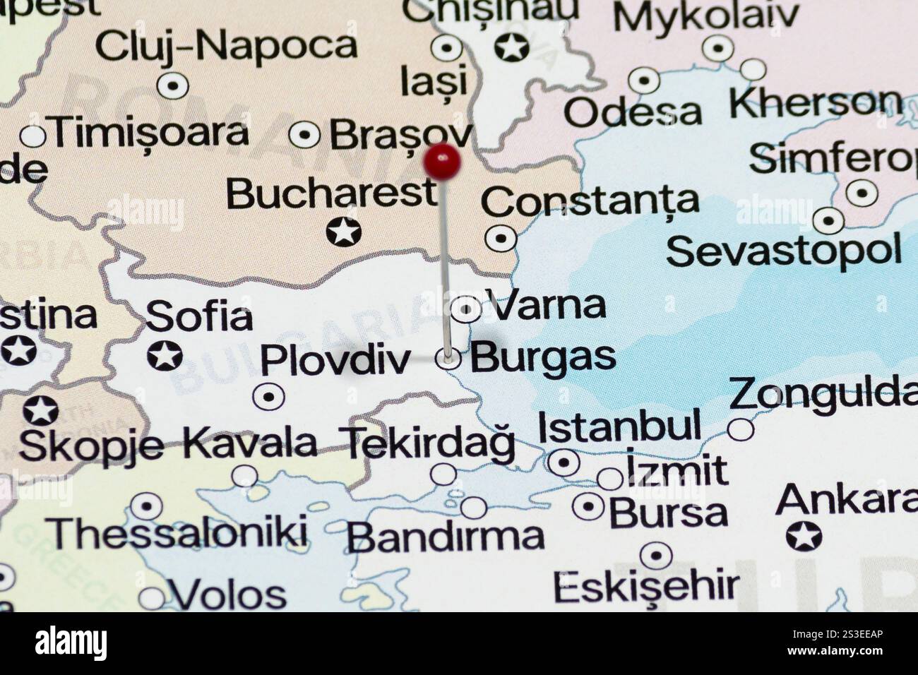 Macro photo of a red pin needle into Burgas city of Bulgaria political ...