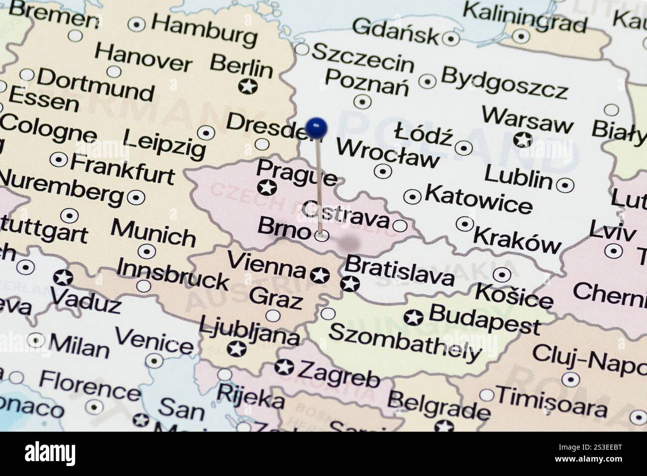 Macro photo of a blue pin needle into Brno city of Czech Republic ...