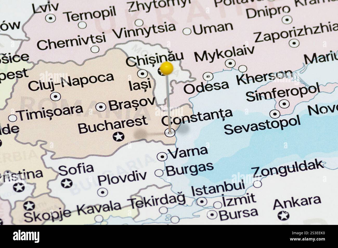 Macro photo of a yellow pin needle into Constanta city of Romania political map Stock Photo - Alamy
