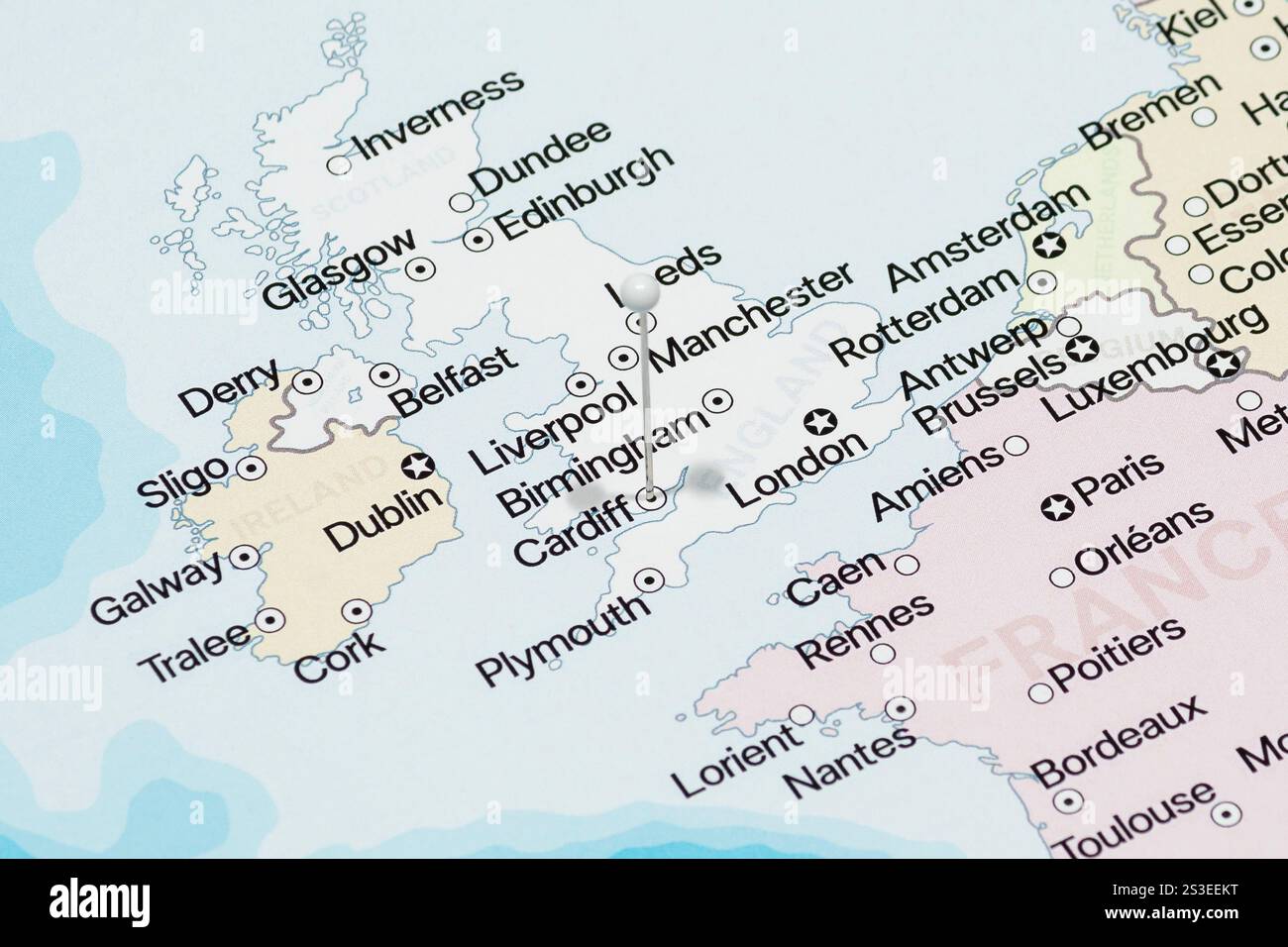 Macro photo of a white pin needle into Cardiff city of Wales political ...