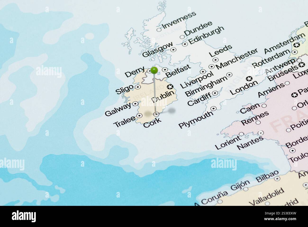 Macro photo of a green pin needle into Cork city of Ireland political ...