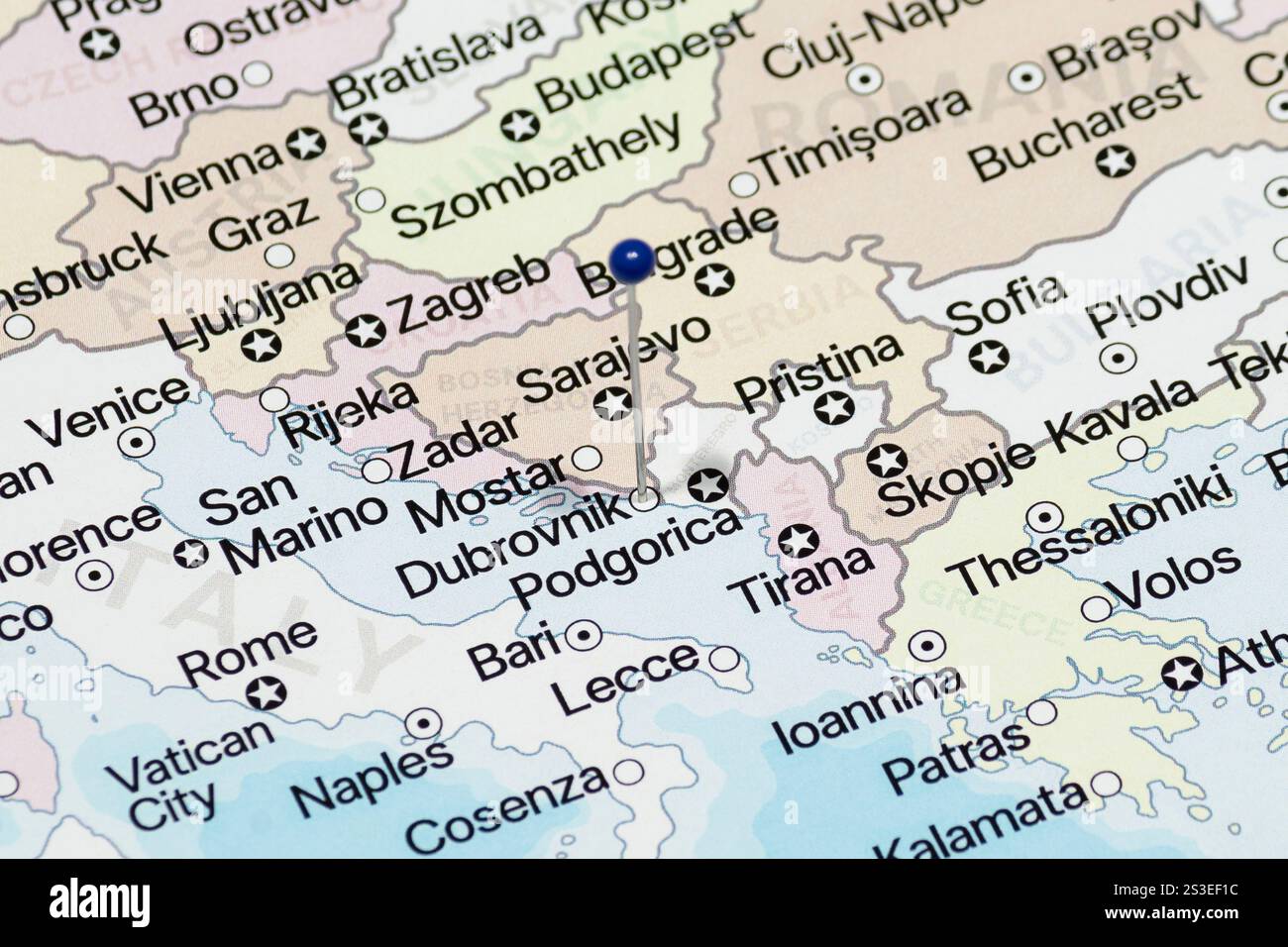 Macro photo of a blue pin needle into Dubrovnik city of Croatia ...