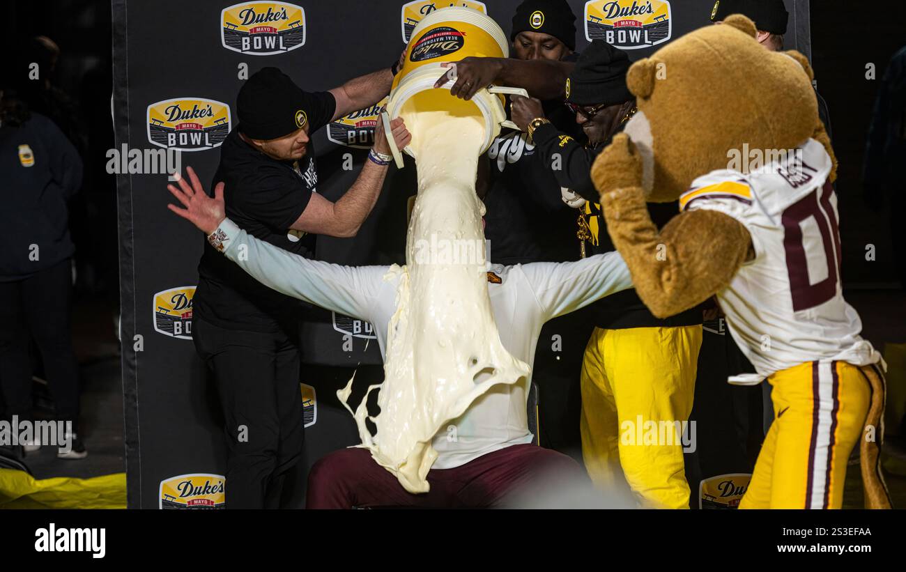 Minnesota head coach P.J. Fleck receives the Mayo dump after winning ...