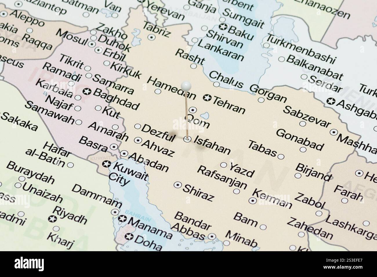 Macro photo of a white pin needle into Isfahan city of Iran political ...