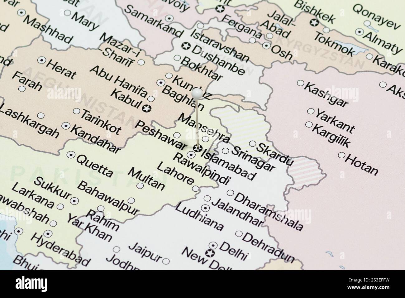 Macro photo of a white pin needle into Islamabad city of Pakistan ...