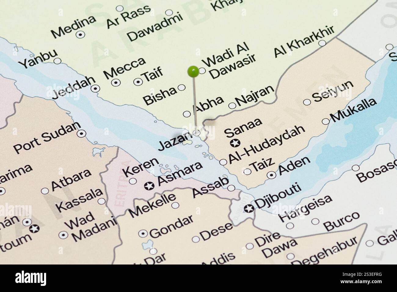 Macro photo of a green pin needle into Jazan city of Saudi Arabia ...