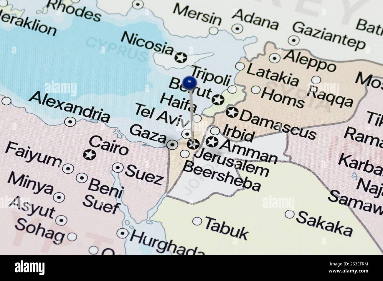 Macro photo of a blue pin needle into Jerusalem city of Israel ...