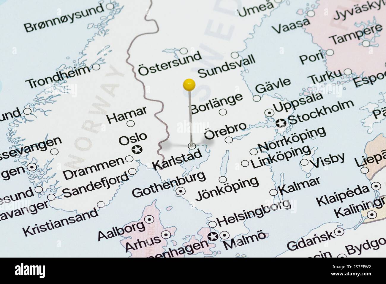 Macro photo of a yellow pin needle into Karlstad city of Sweden ...