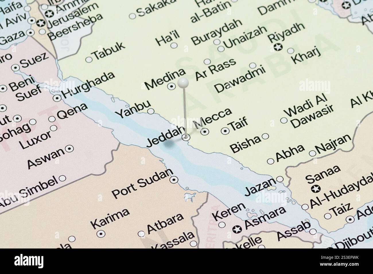 Macro photo of a white pin needle into Jeddah city of Saudi Arabia ...