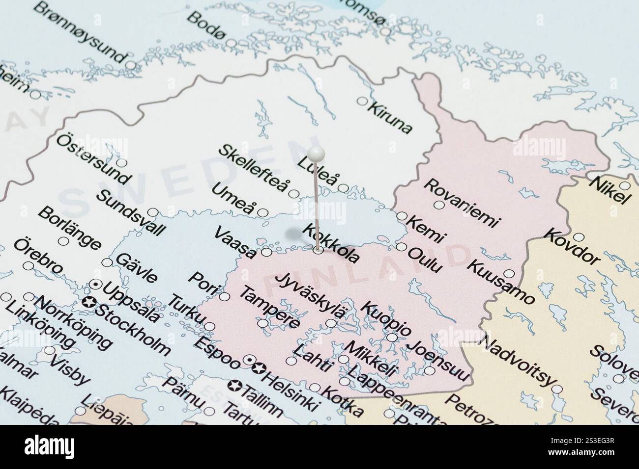 Macro photo of a white pin needle into Kokkola city of Finland ...
