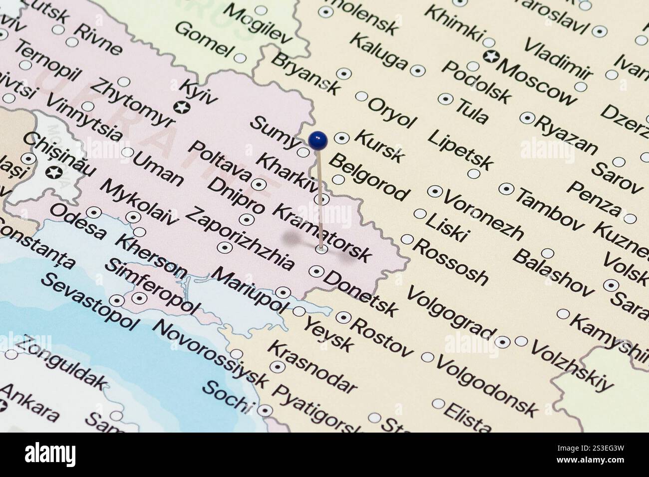 Macro photo of a blue pin needle into Kramatorsk city of Ukraine ...