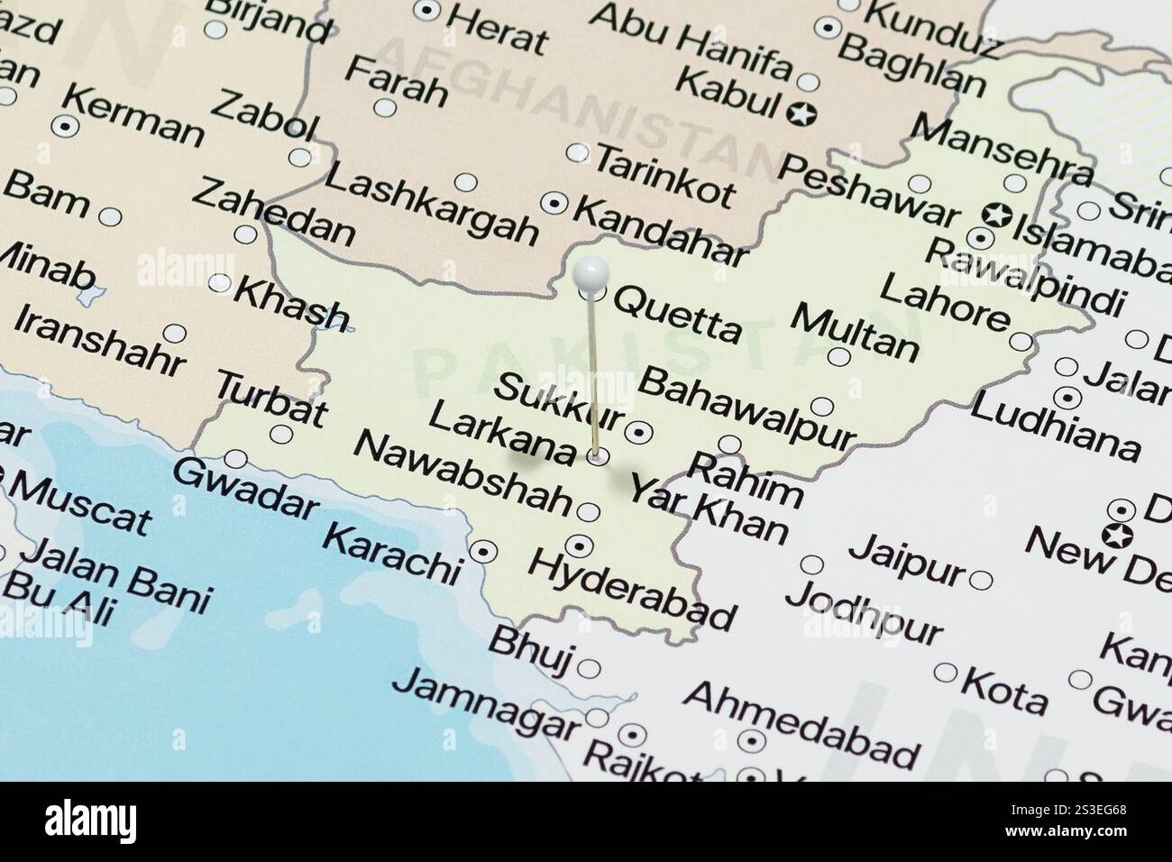 Macro photo of a white pin needle into Larkana city of Pakistan ...